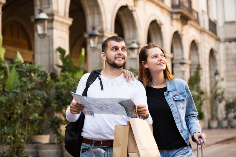 Tourists Walking with Map at Street Stock Image - Image of tourists ... Tourists Walking with Map at Street Stock Image - Image of tourists ...