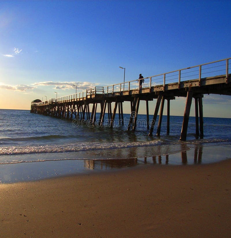 Wooden pier at sunset stock image. Image of scenic, cloud - 632381