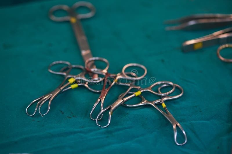 Surgical Instruments on the Green Table in Operating Room Stock Photo ...