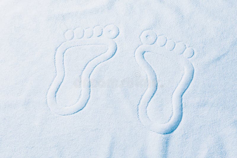 Towel with Footprints in a Bathroom Stock Image - Image of blue, close ...