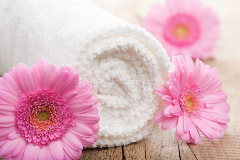 Towels and flowers for spa stock image. Image of flower - 25888861