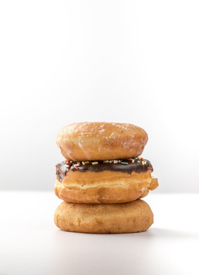 Tower of Assorted Donuts Isolated on White Background Stock Photo ...