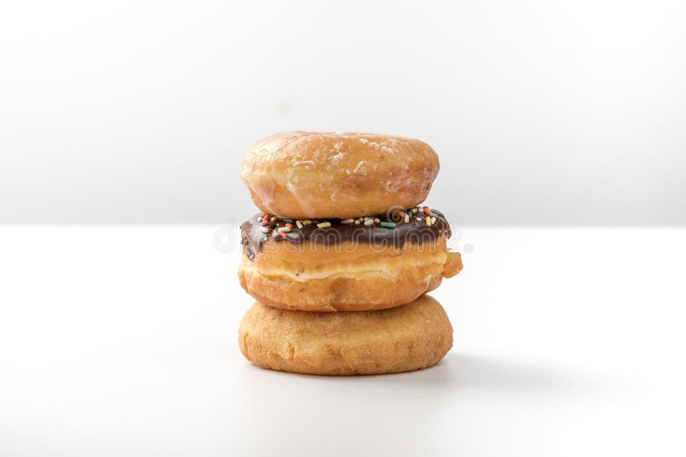 Tower of Assorted Donuts Isolated on White Background Stock Photo ...