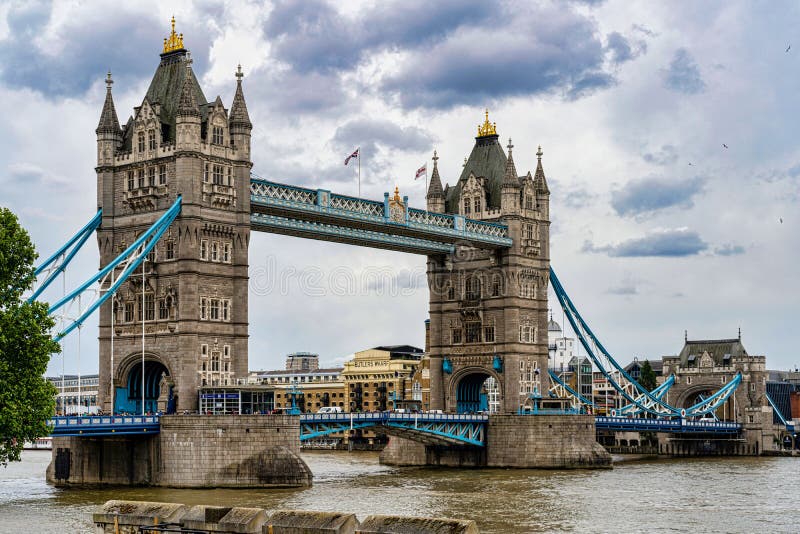 Tower Bridge Crossing the River Thames in London on a Cloudy Day ...