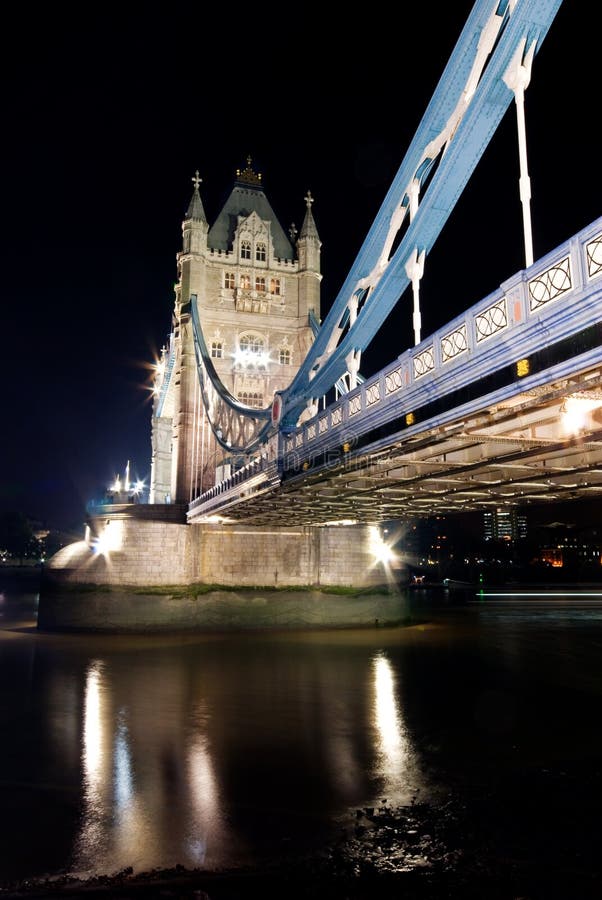 London, UK, Tower Bridge at Night with Light Trails of Buses and Cars ...