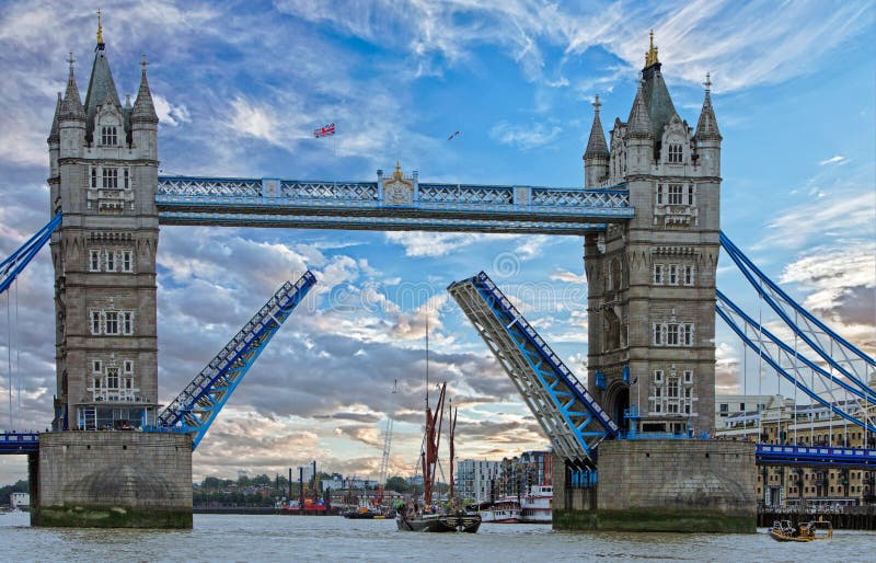 Tower Bridge Opens To Allow a Tall Ship To Pass through Stock Image ...