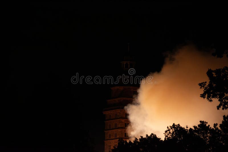 Tower of a Castle in Smoke after a Big Fireworks Display at Night Stock ...