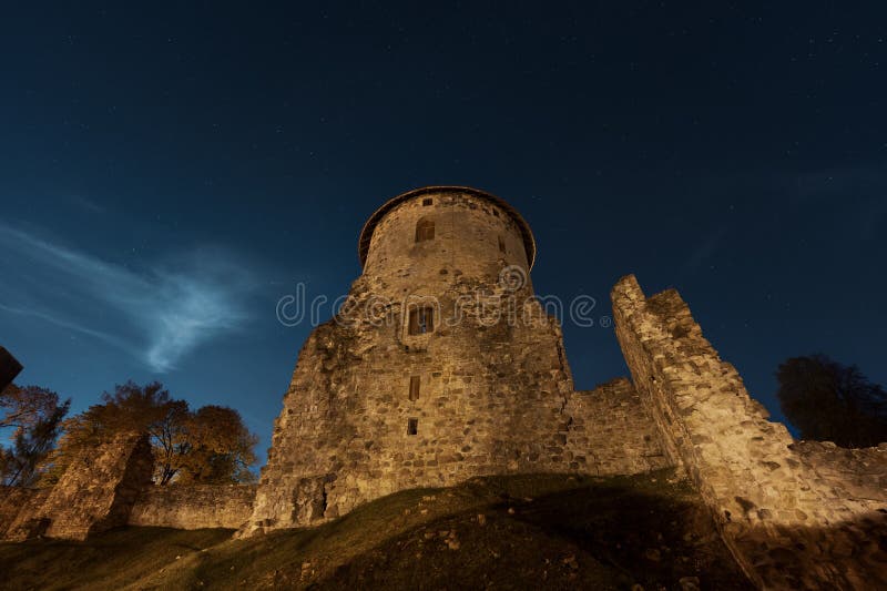 The Tower of Cesis Castle in Latvia Against the Backdrop of the Starry ...