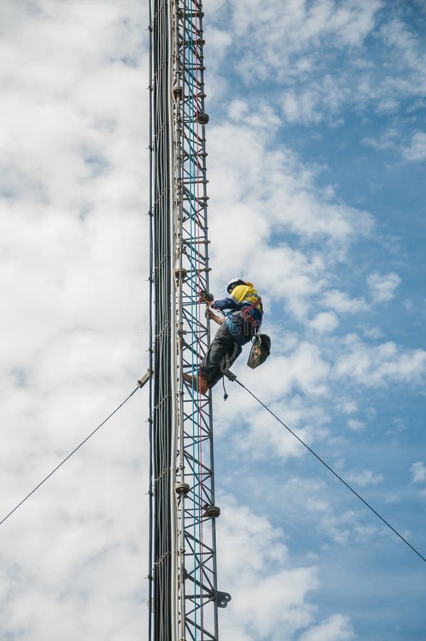 Tower climber and working stock photo. Image of electricity - 35152982