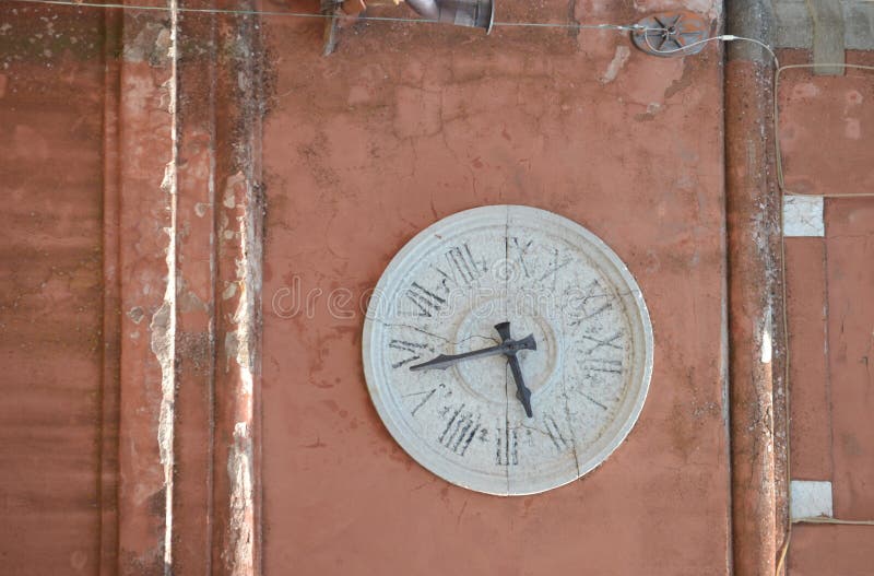 Tower Clock with Roman Numerals in Front of Brick Wall Stock Photo ...