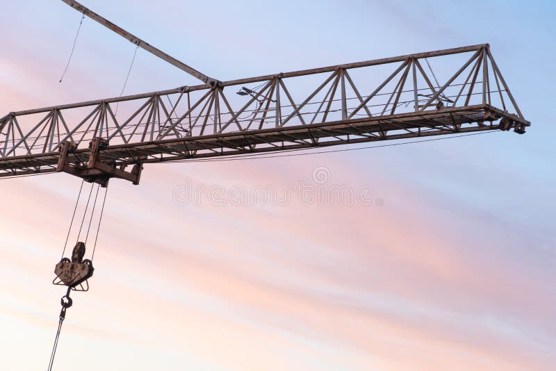Tower Crane on the Background of the Sky at Sunset. the Boom of a ...