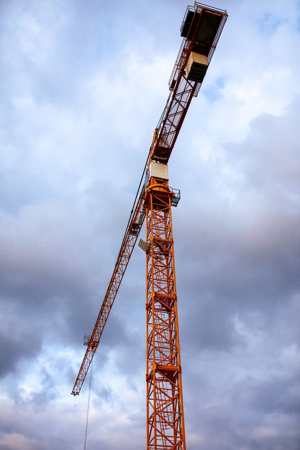 Tower Crane on a Background of Thunderclouds Stock Photo - Image of ...