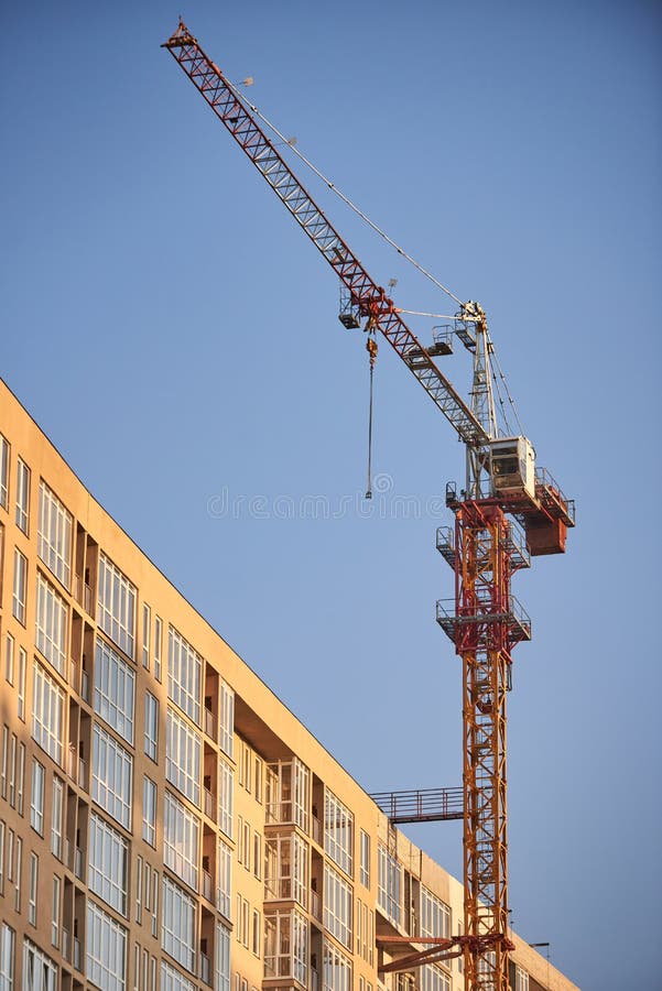 Tower Crane on the Construction Site with City Building Background at ...