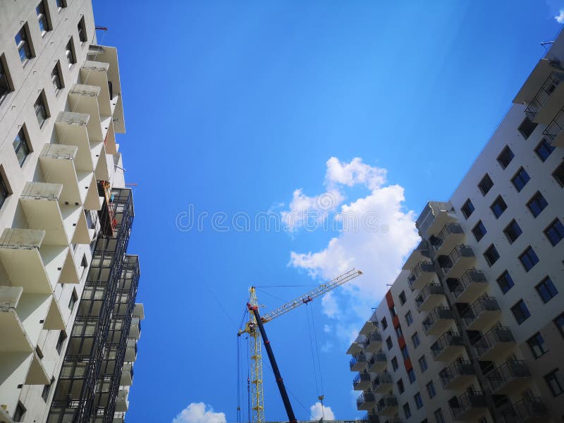 Tower Crane at the Construction Site. Construction of Panel Houses ...