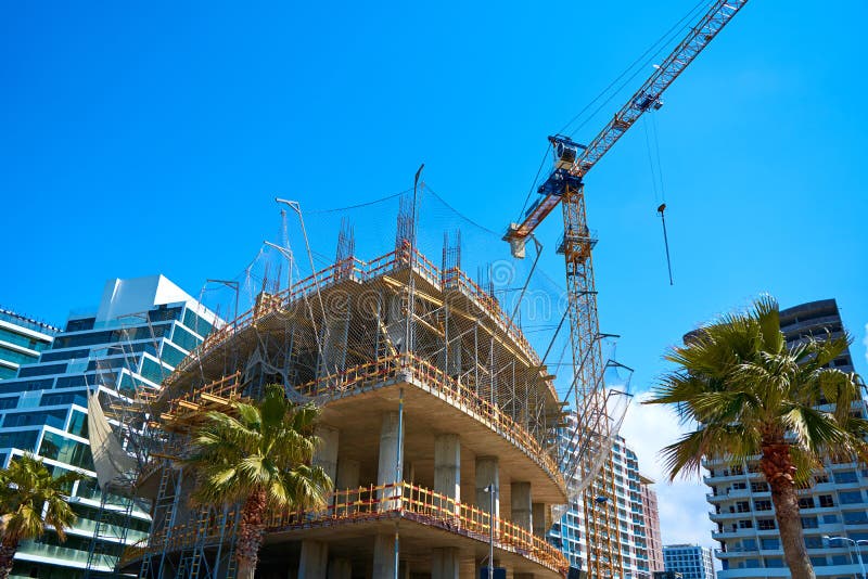 Tower Crane on the Construction Site of a Modern Building Near the Sea ...