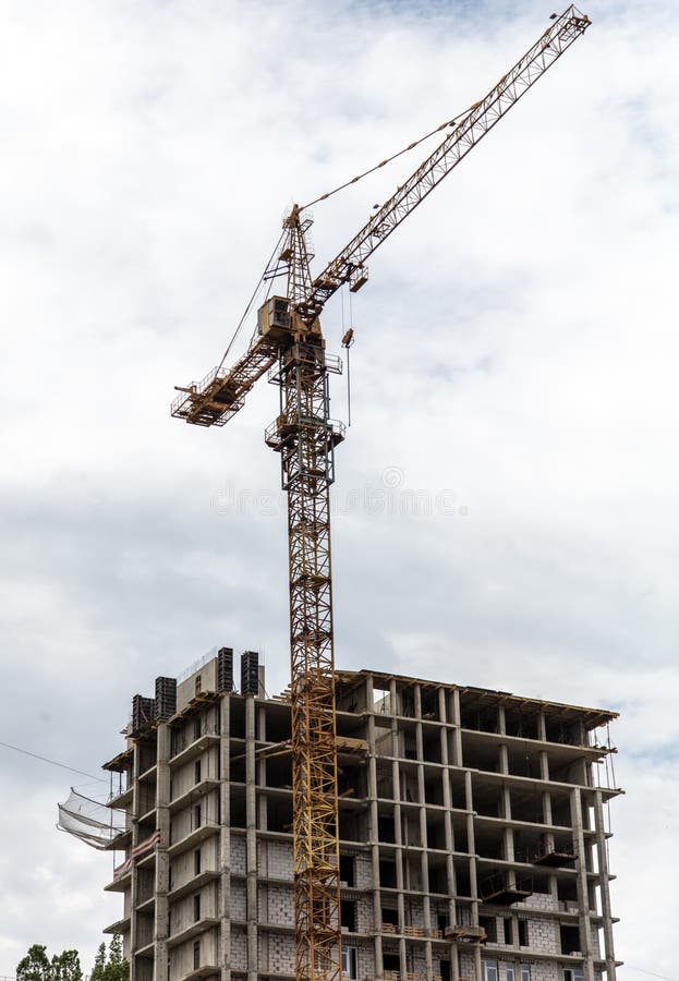 Tower Crane at the Construction Site of a Multistory Building Stock ...