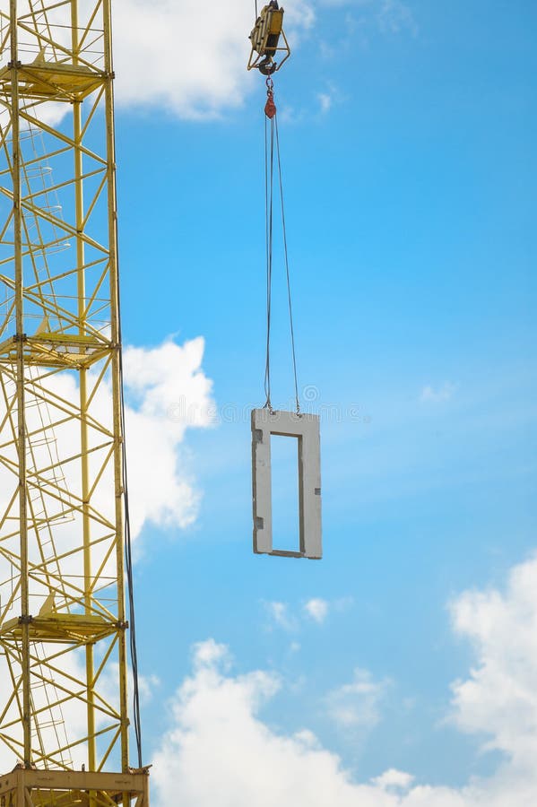 Tower Crane Builds a House Against the Sky.Building Construction. Construction Site. Stock Photo ...