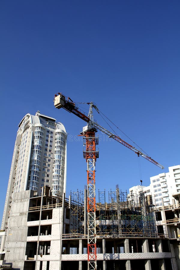 Tower Crane Over Concrete Frame of Building Construction Stock Photo ...