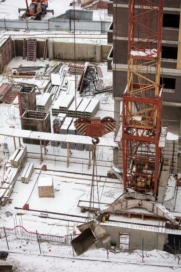Tower Crane on Rails at a Construction Site in Winter Stock Photo ...
