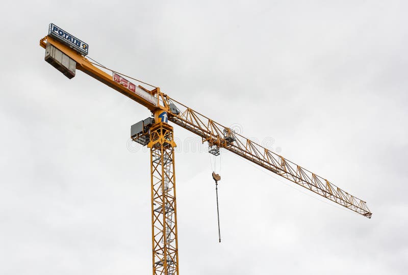 Tower crane in the sky editorial photo. Image of site - 152583356