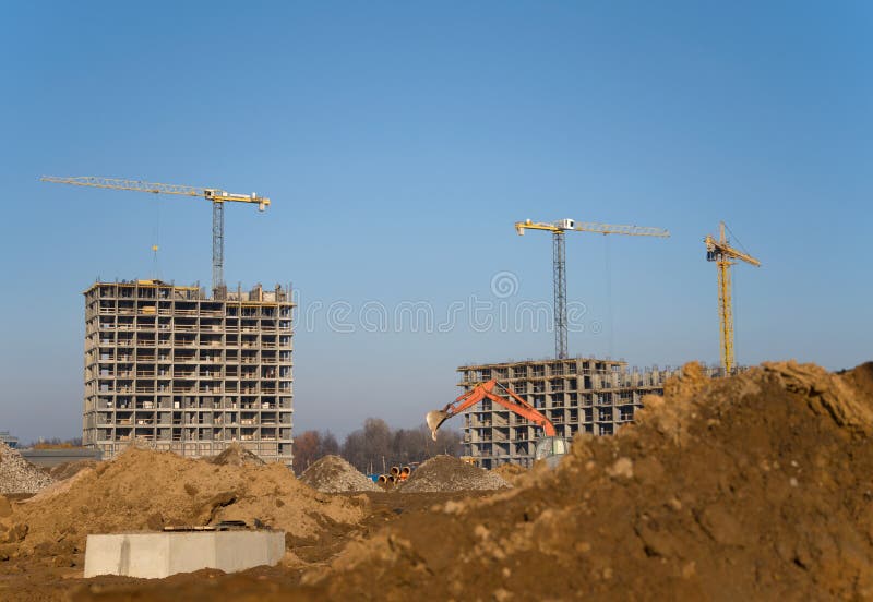 Tower Cranes Constructing New Residential Building at Construction Site ...
