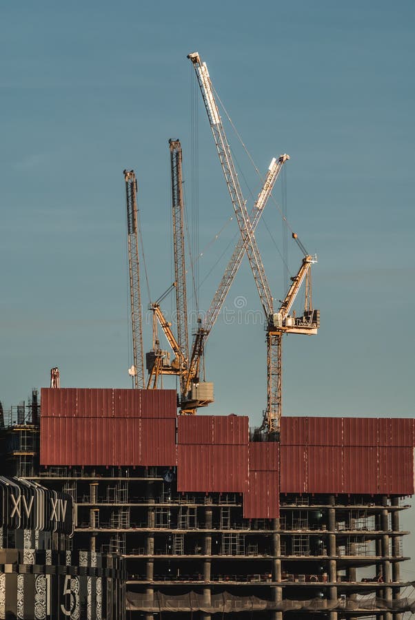 Tower Cranes Constructing a New Residential Buildings at a Construction ...