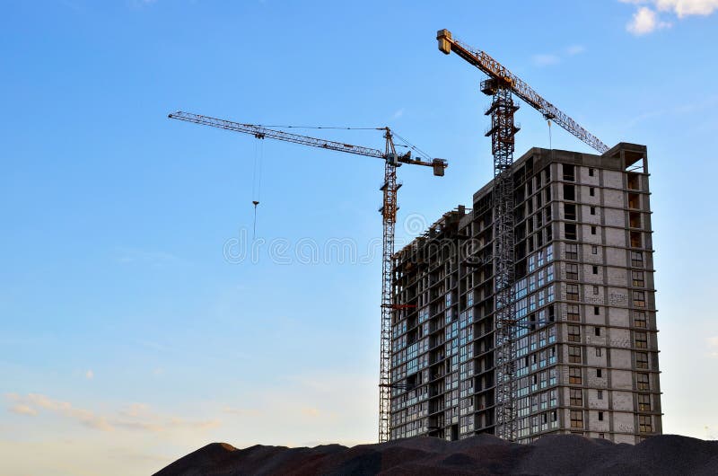 Tower Cranes at Construction Site, Construction of High-rise Building ...