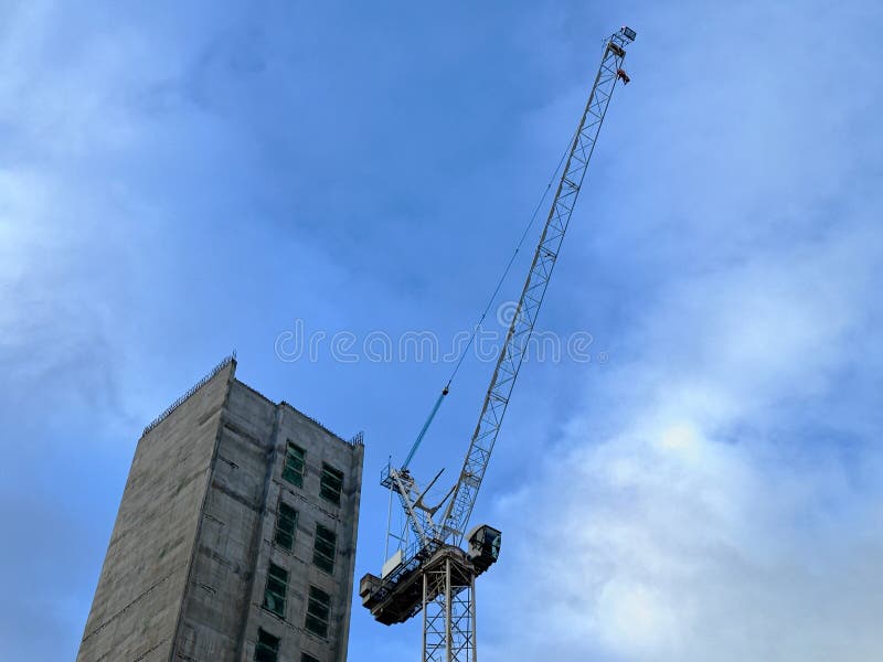 Tower Cranes at New High Rise Apartment Development during Construction ...