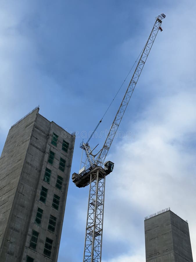 Tower Cranes at New High Rise Apartment Development during Construction ...