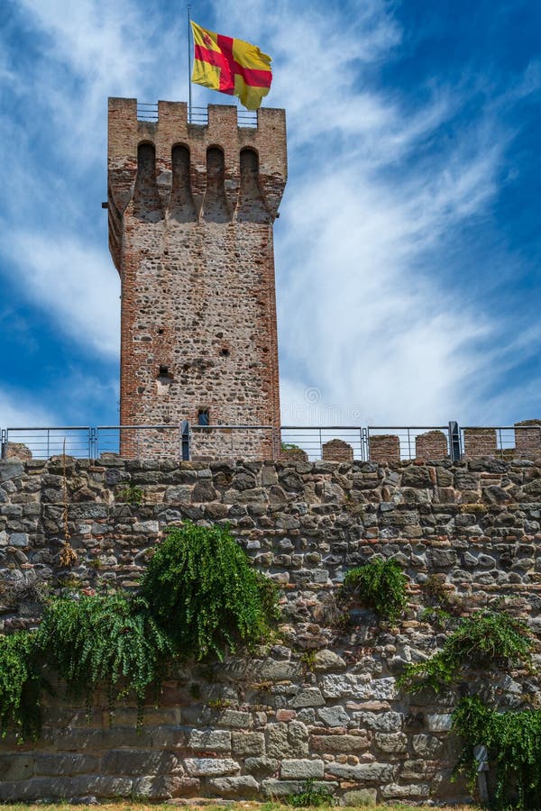 The Tower Of Este Castle With Flag Surrounded By Old Brickwall I Stock ...