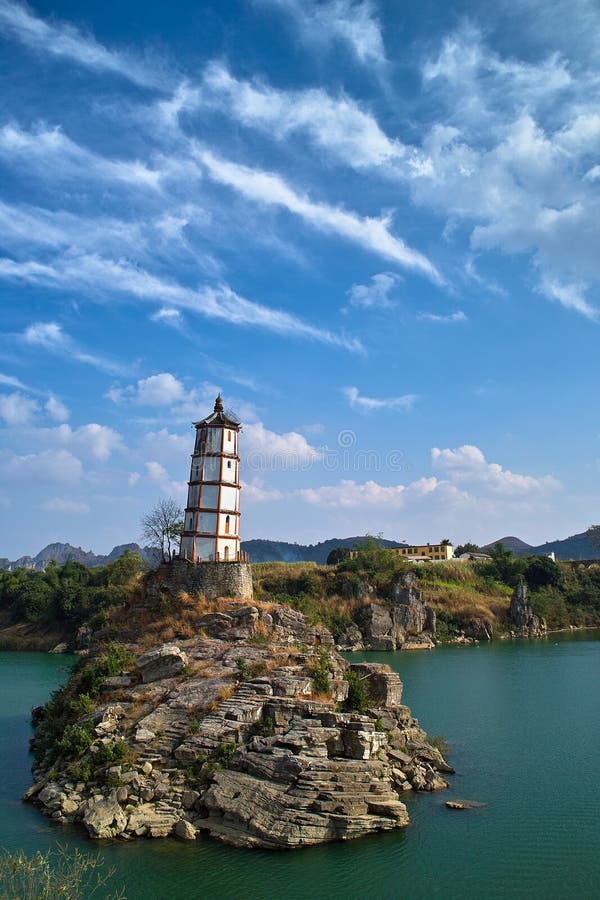 Tower on island in ocean stock image. Image of asian - 12582227