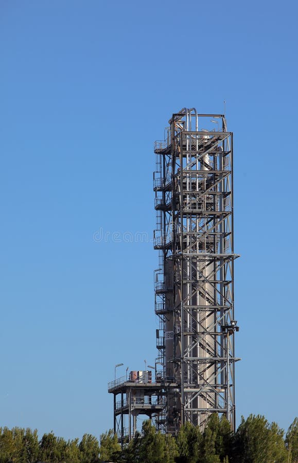 Tower in a oil refinery stock image. Image of industry - 17472601