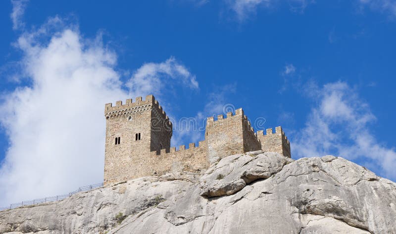 The Tower on a Rock on a Blue Sky Background Stock Image - Image of ...