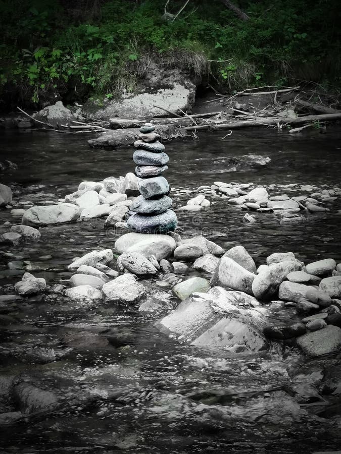 Tower of Rocks in a Small River Over the Flow. Stock Photo - Image of ...
