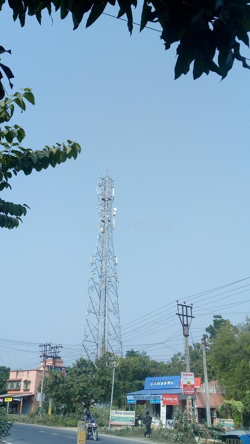 Tower with Sky & Roadside Editorial Stock Image - Image of tower, shop ...