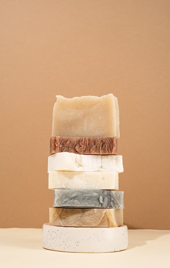 Tower Stack of Different Handmade Soaps on Cream Background Stock Photo ...