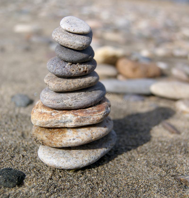 Round Pebble Tower on the Beach Stock Image - Image of stability ...