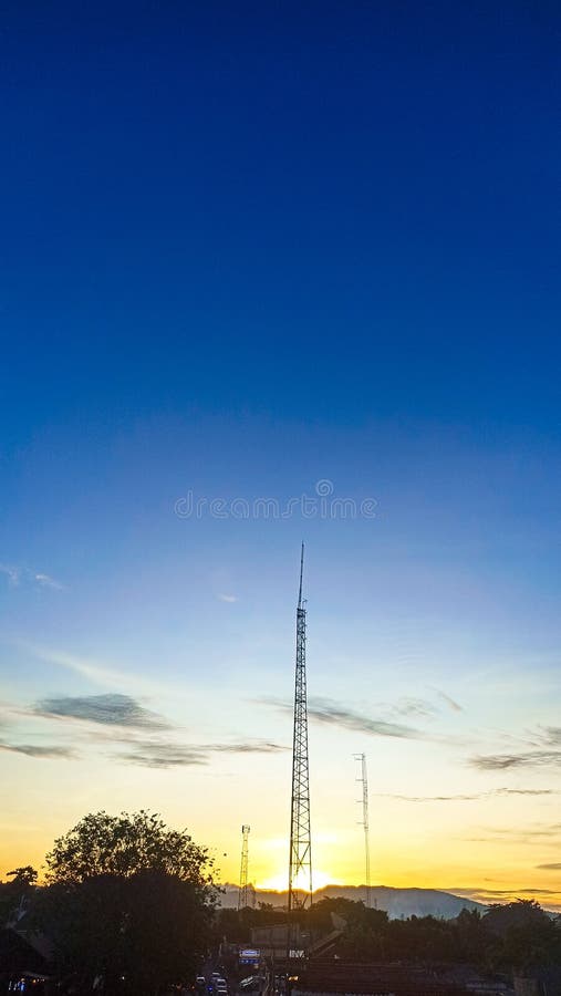 Tower with Sunset Background with Blue Sky Stock Photo - Image of ...