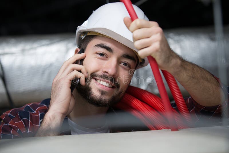 Tower Technician Talking on Cell Phone Stock Image - Image of ...