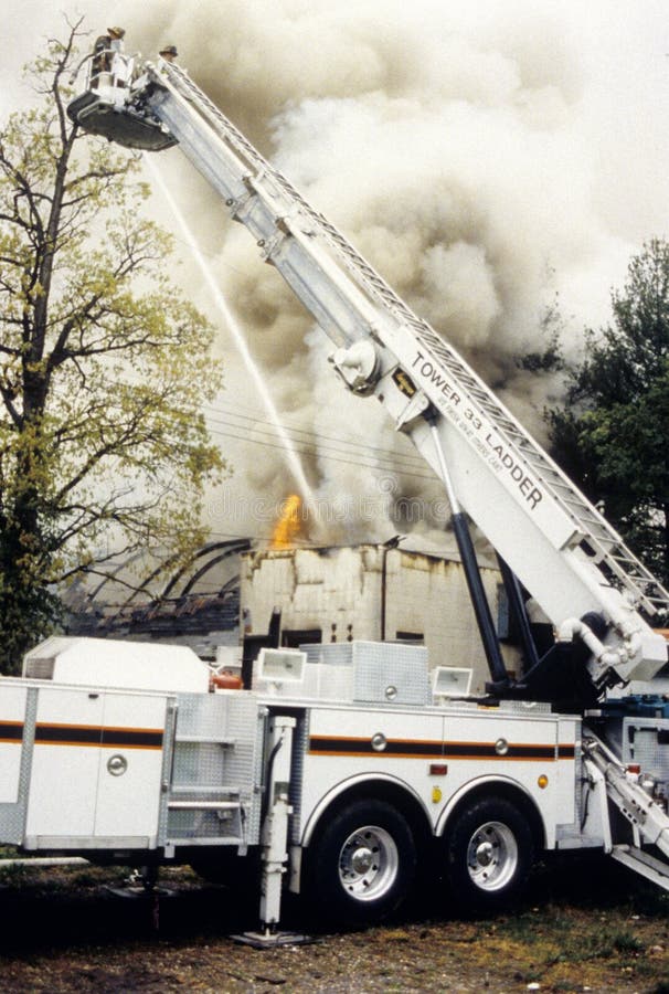 Tower Fire Truck Fighting a Building Fire Editorial Image - Image of ...