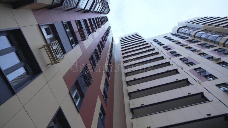 Towering Apartment Complex with Sleek Geometric Design Stock Video ...
