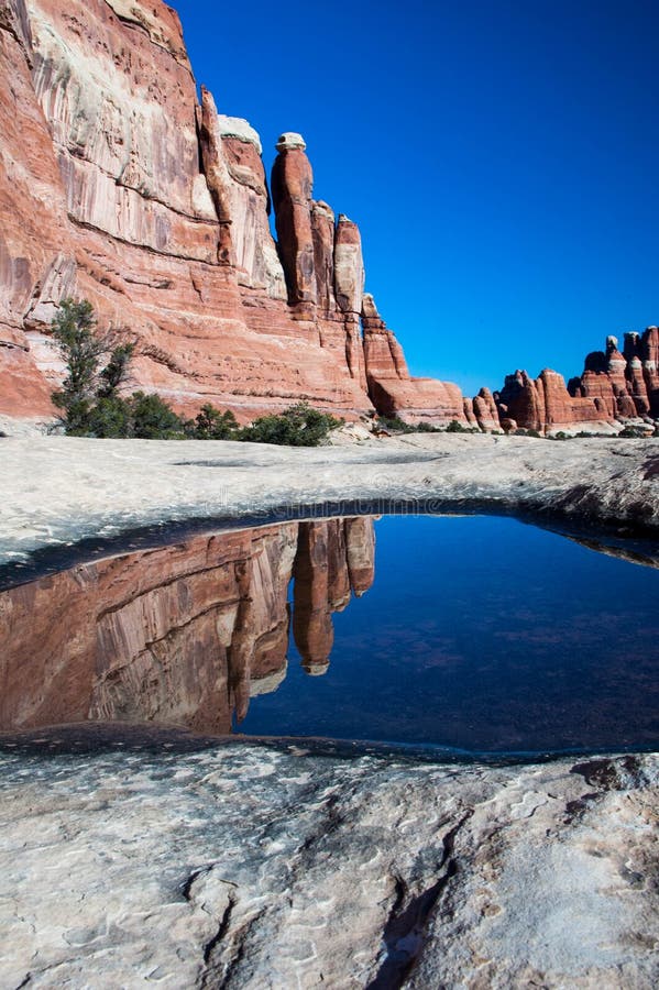 Towering Cliffs with Reflection from Pothole Stock Image - Image of ...