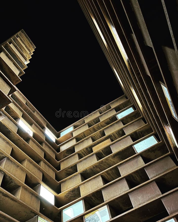 Towering Concrete Structure, Featuring Numerous Windows, Situated in an ...