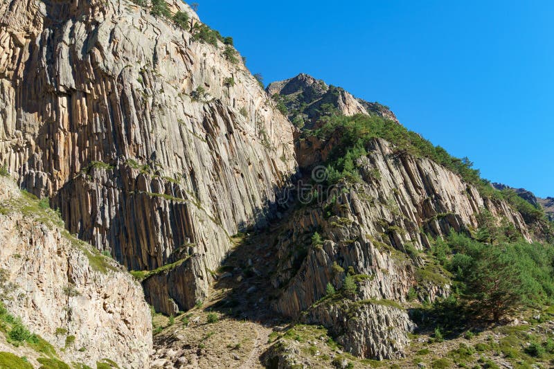 Towering Rock Formations Dominate the Landscape, with Rugged Cliffs and ...