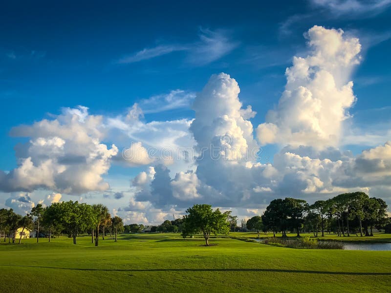 Towering Storm Clouds stock image. Image of golf, scene - 233732443