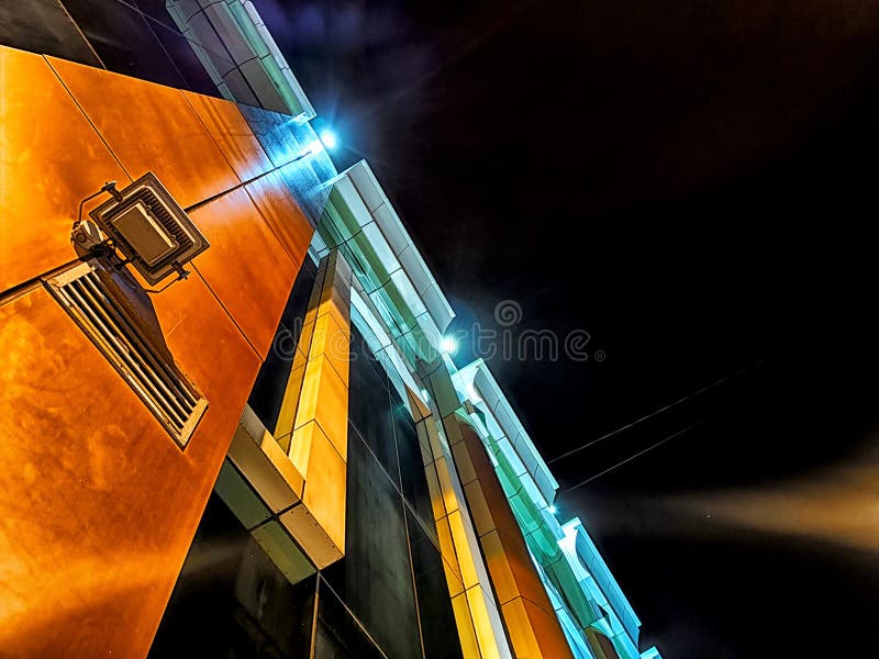 A Towering Structure Features Bright Lights that Enhance Its Angular ...