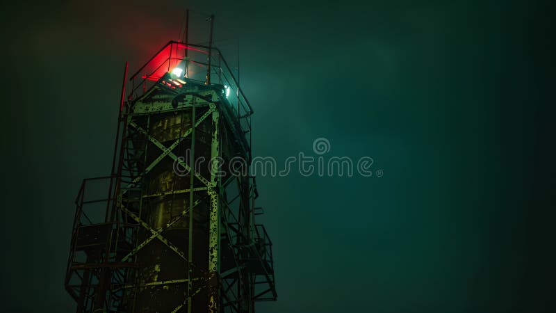 The Towering Structure Illuminated at Night a Beacon of Progress and ...