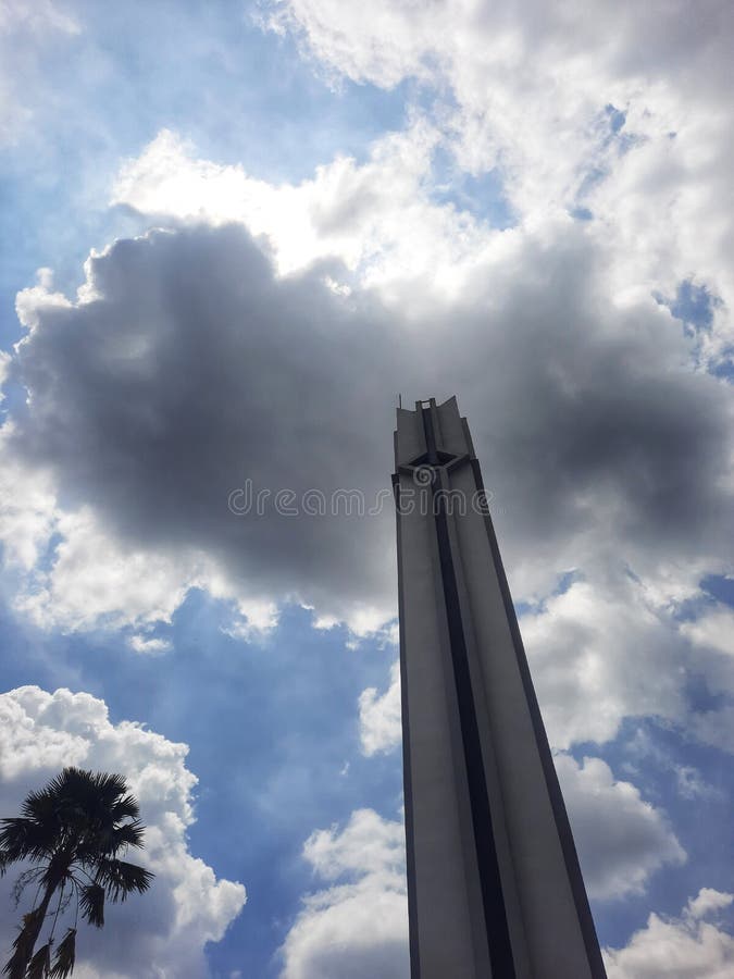 Towering Tower with a Slightly Overcast Sky As a Background Stock Photo ...