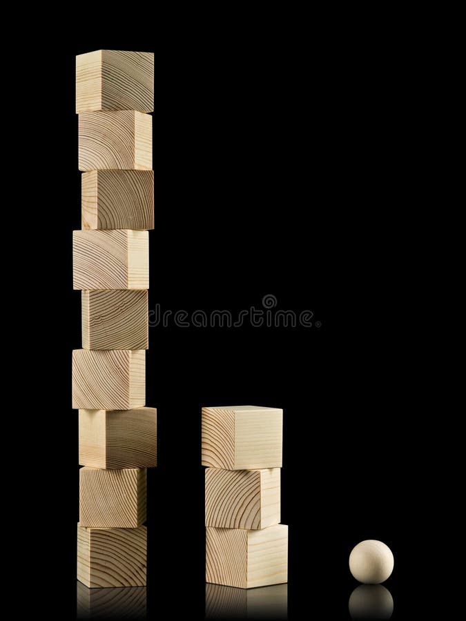 Towers from wooden cubes stock photo. Image of tower - 69947376