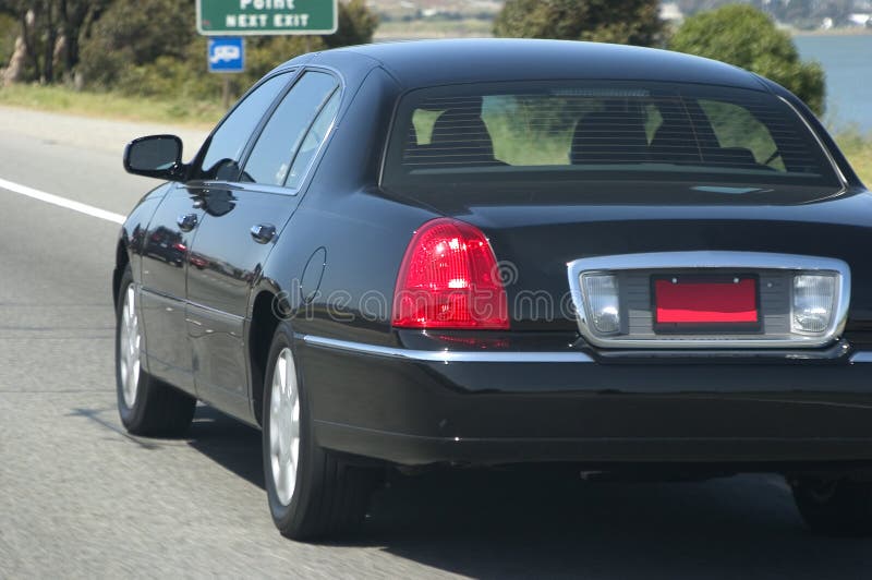 Town Car on Freeway stock image. Image of black, nice, limo - 486637